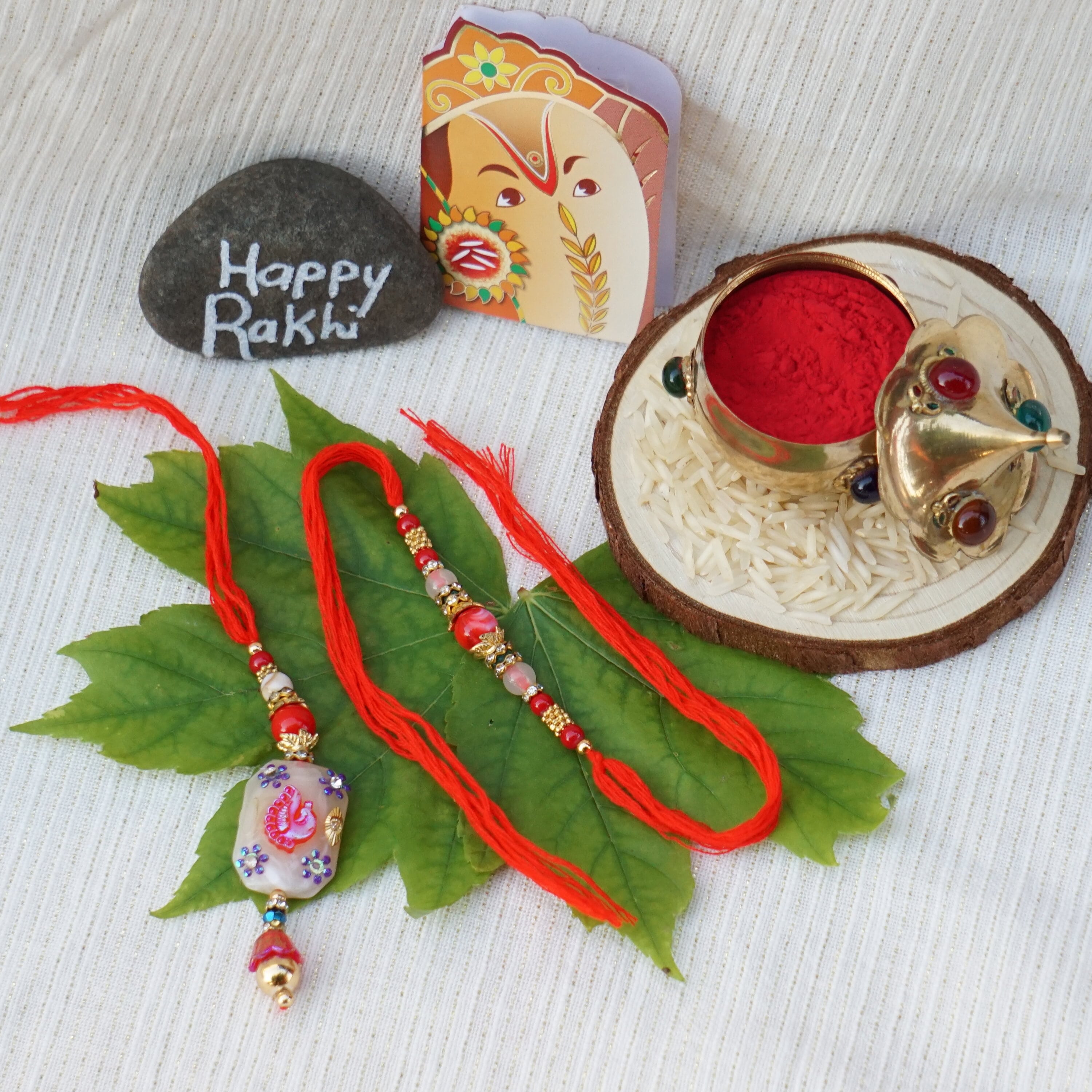 UtsaWe GIFT HAMPER - Beautiful Peacock Couple Rakhi With Shiny Beads ...