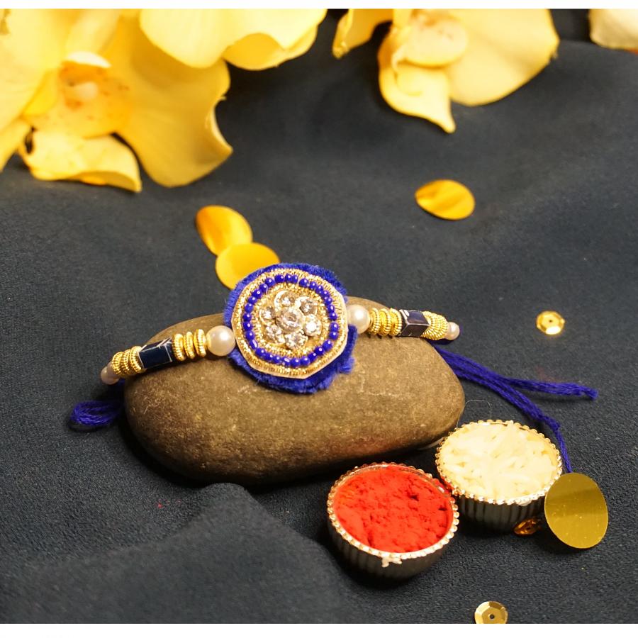 Designer Blue Round Rakhi Surrounded By Blue Beads + Roli & Chaval ...