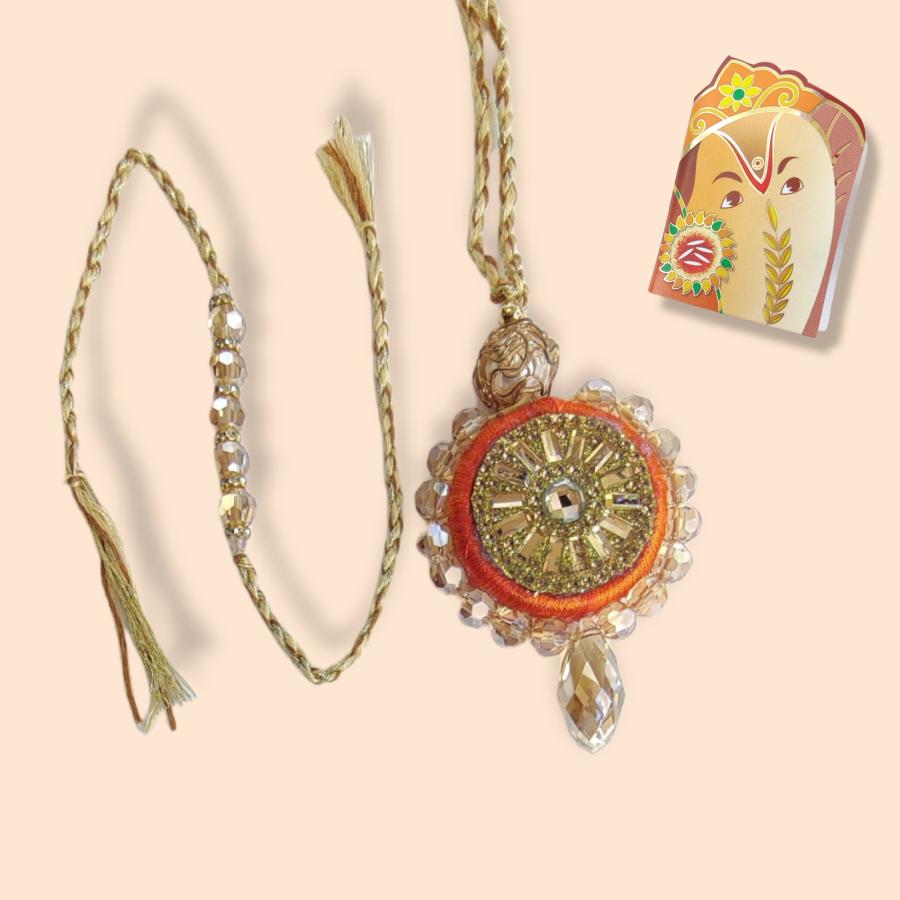 Crystal Lumba Rakhi With Orange Resham Thread + Roli & Chaval #54688 ...