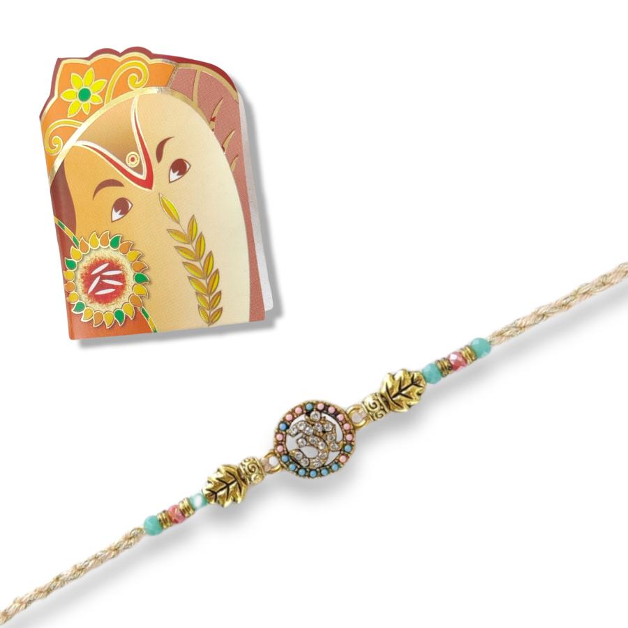 Adorable OM Rakhi with Cute Little Leaves on Side + Roli & Chaval ...