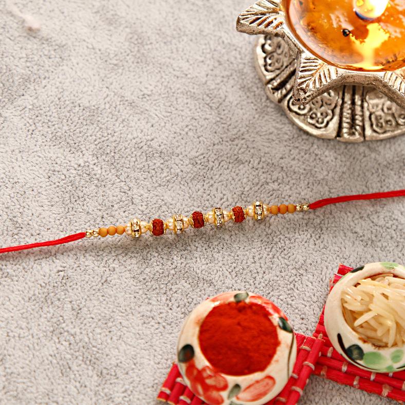 Elegant Divine Design Rudraksh Rakhi #34219 | DesiClik.com, USA
