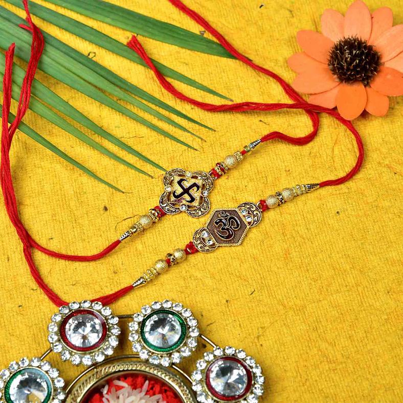Traditional Set of Two Om & Swastik Rakhi #34232 | DesiClik.com, USA